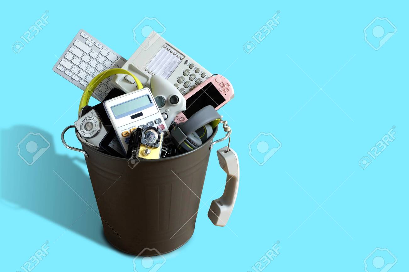 Electronic Waste Broken Or Damage In Dustbin Isolated On Blue Background And Leave Blank Space Above For Text Input Reuse And Recycle Concept Stock Photo Picture and Royalty Free Image. Image 13989783...