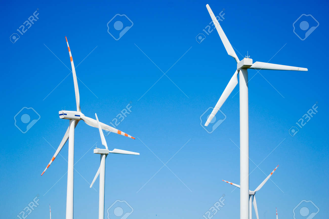 Windmill For Electric Power Production Against Blue Sky. Image 190888753
