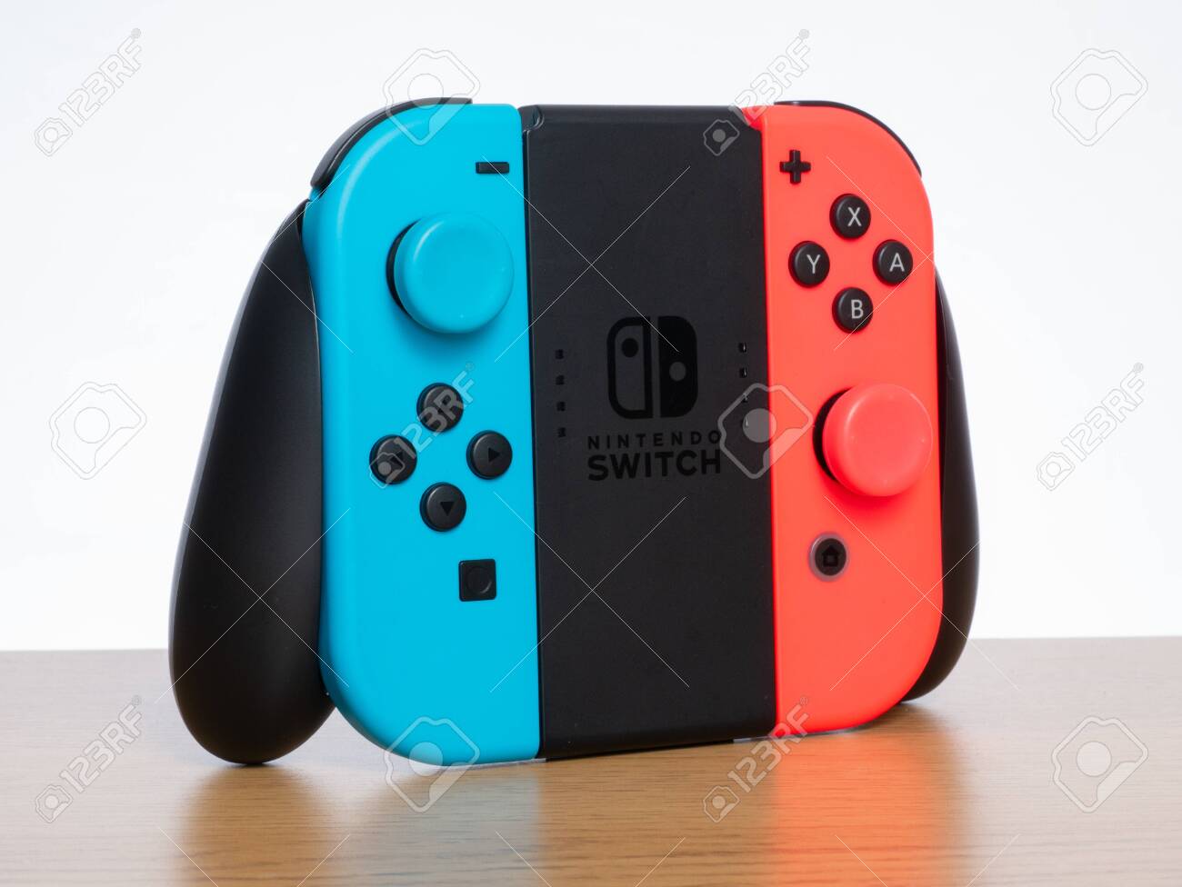 UK April 2020 Nintendo Switch Controller Joy Con Remote Grip Neon Blue And Red Image 143860120